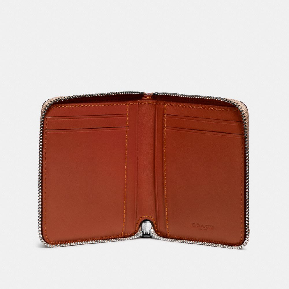 Small Double Zip Around Wallet In Signature Canvas | Paul Smith