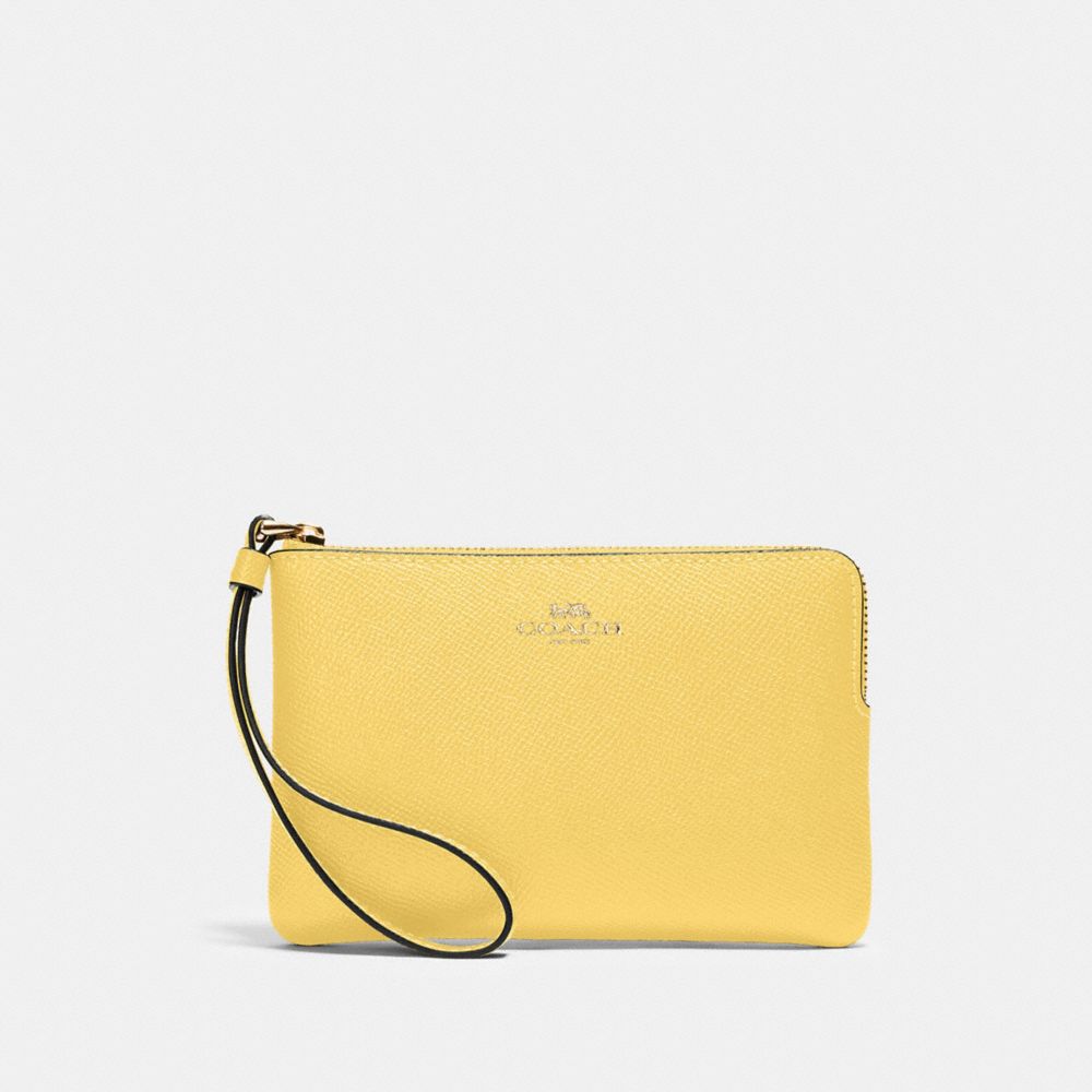 Canary yellow coach wristlet - electrohogar.com.mx