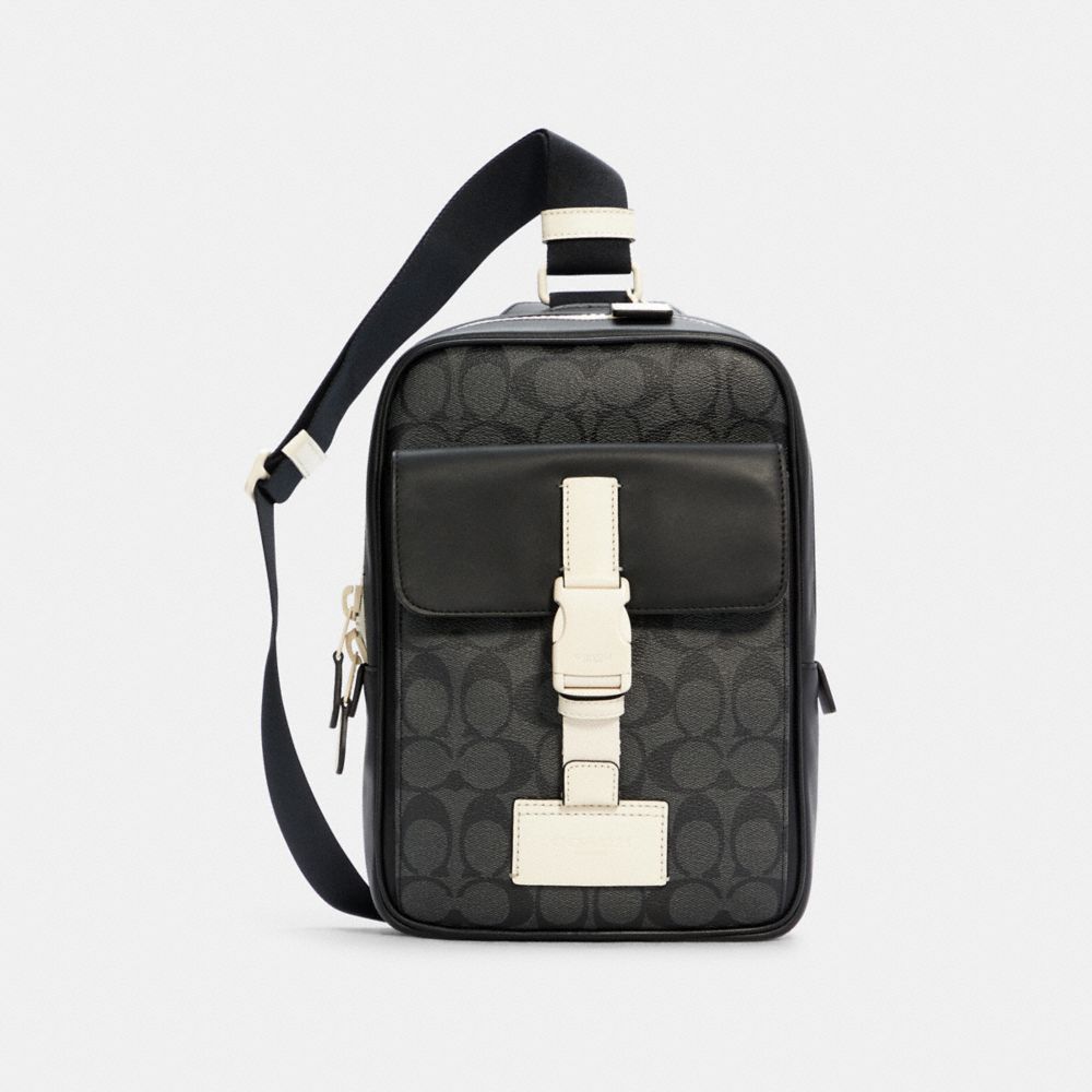 COACH: Track Pack In Signature Canvas
