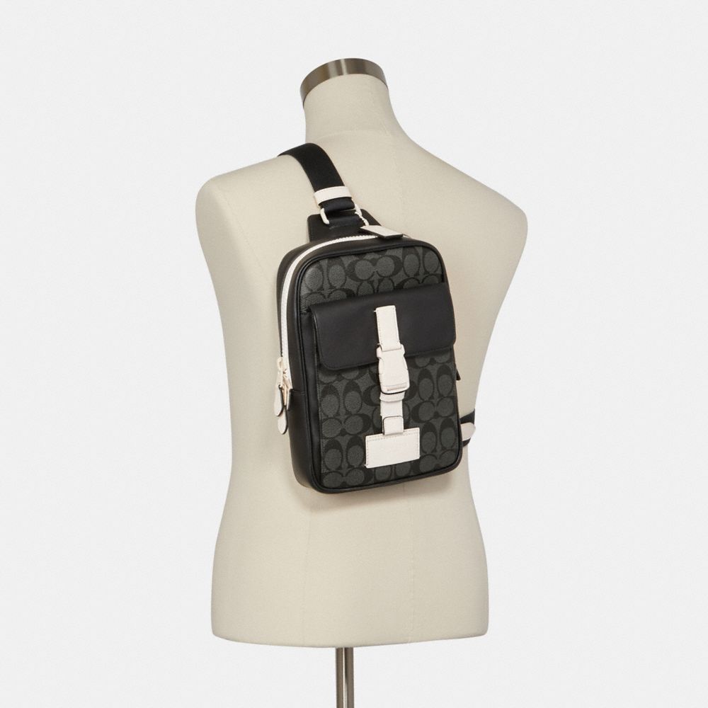 COACH: Track Pack In Signature Canvas