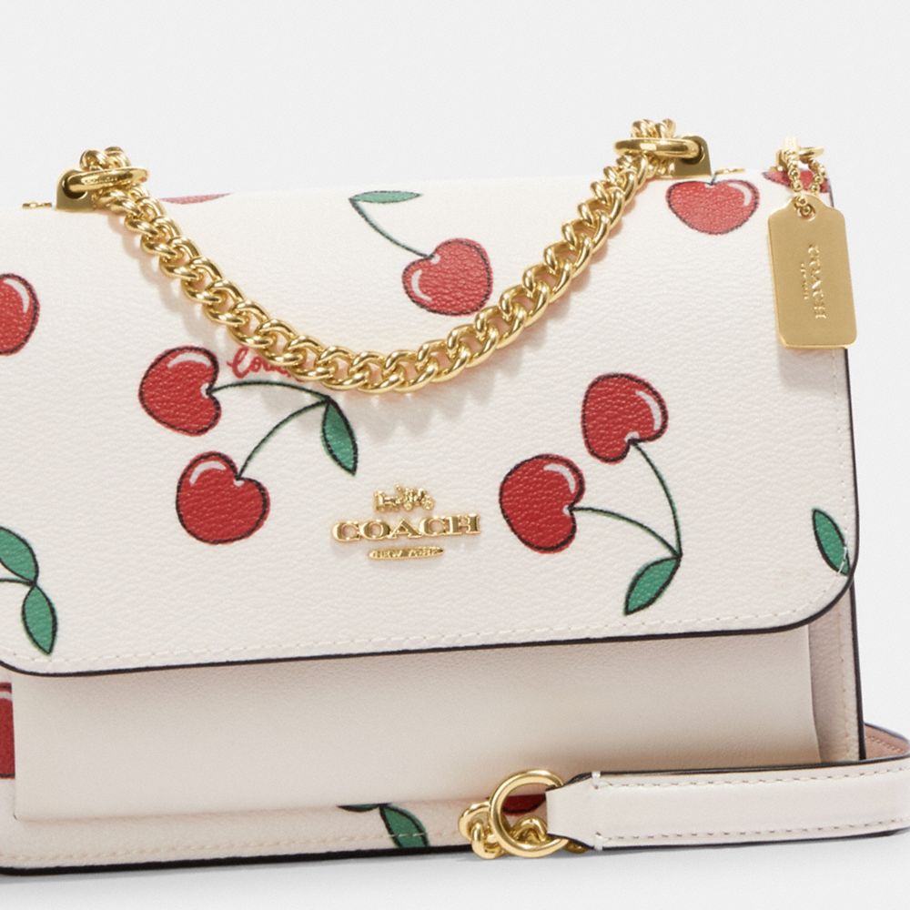 COACH: Bolso cruzado Mini Klare con estampado de corazones de cereza